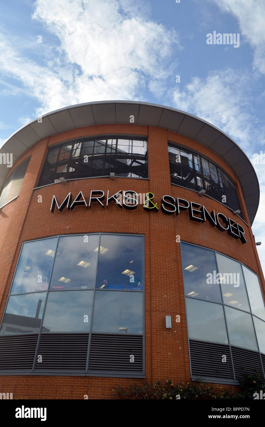 Marks and Spencer shop sign on a modern contemporary glass, concrete ...
