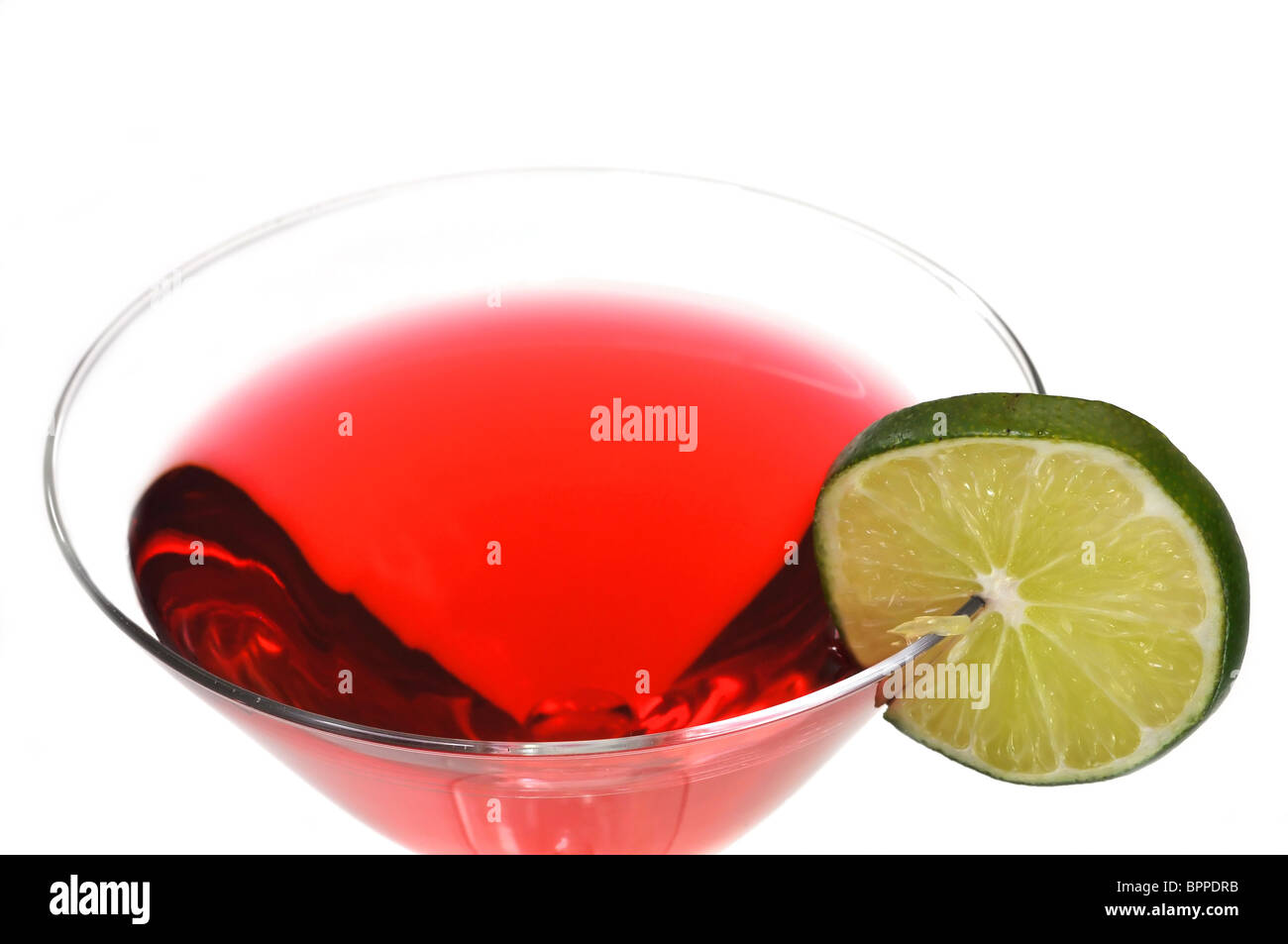 Red Cosmopolitan with lime slice isolated on white background Stock ...