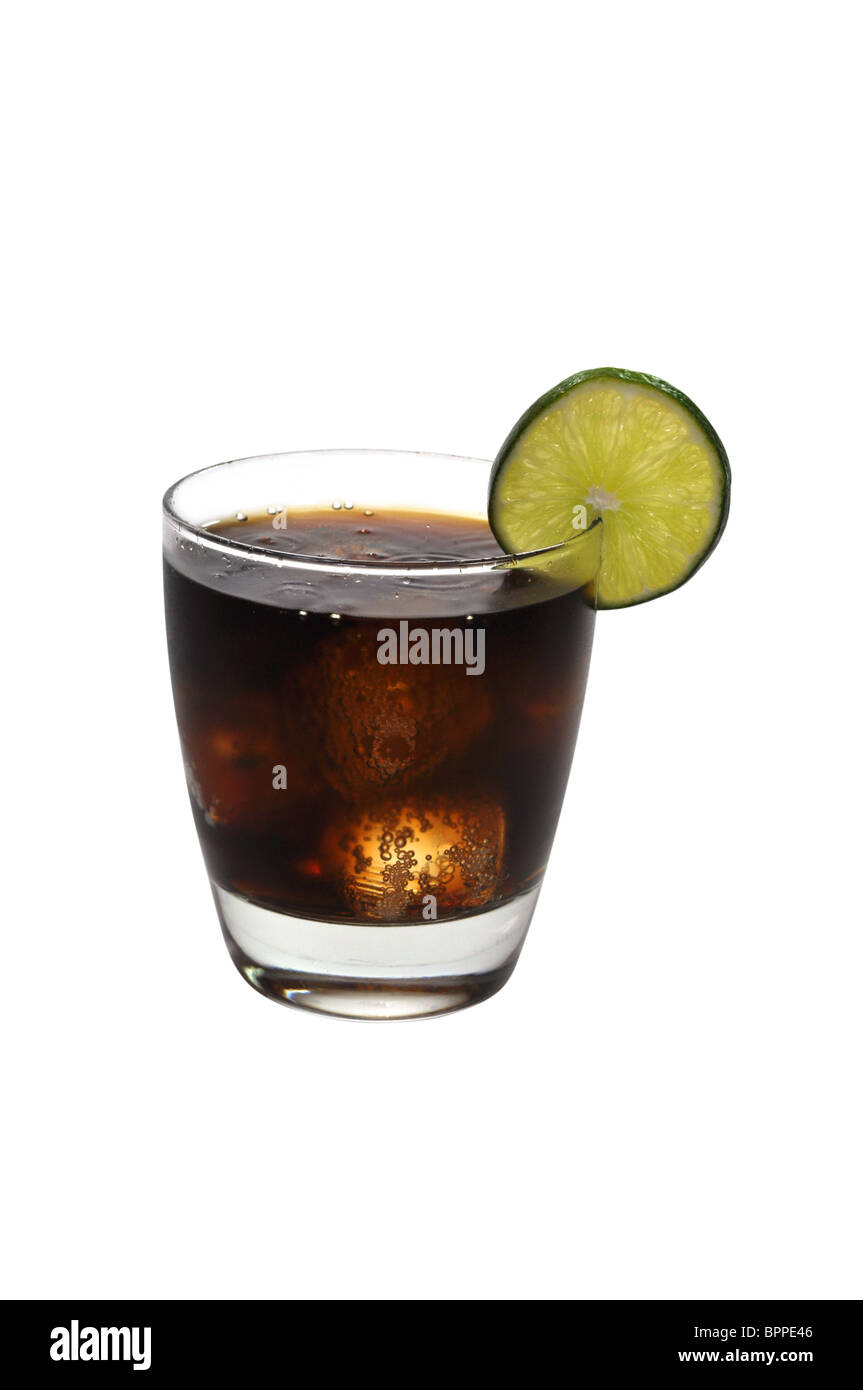 Rum and cola with lime slice isolated on white background with clipping ...