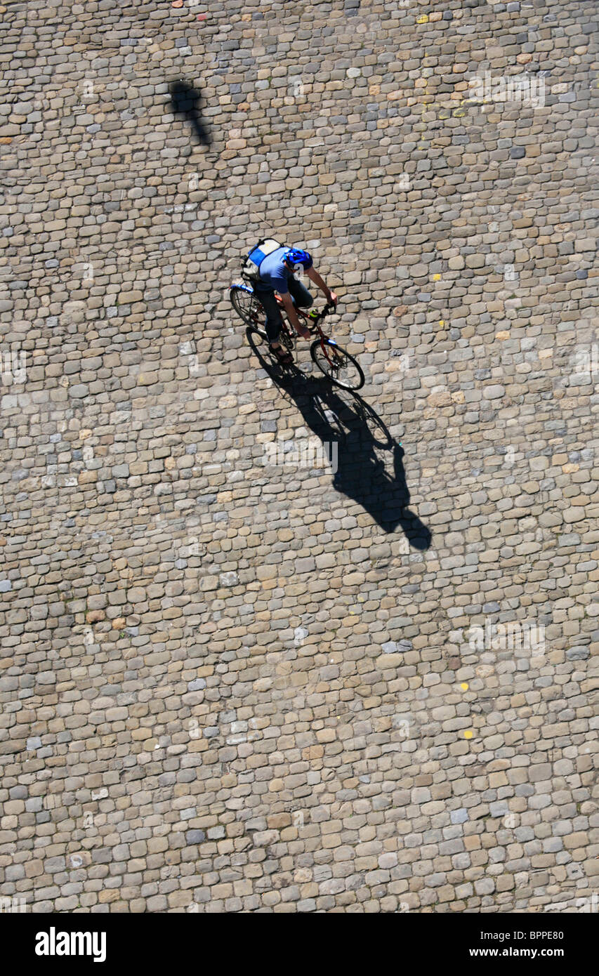 Aerial view of a cyclist on cobbled street, Bern, Switzerland Stock ...