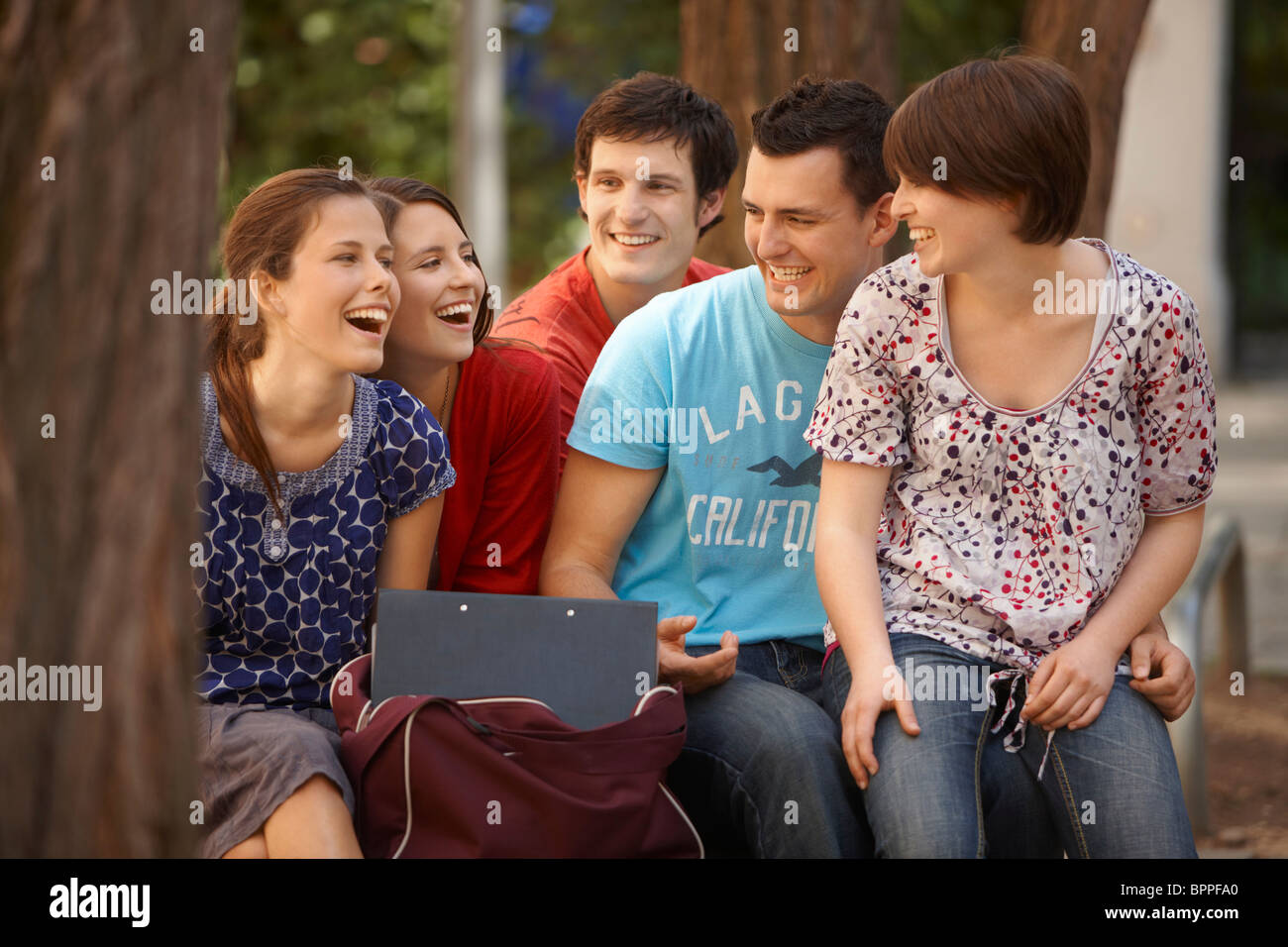 Students studying outdoors Stock Photo - Alamy