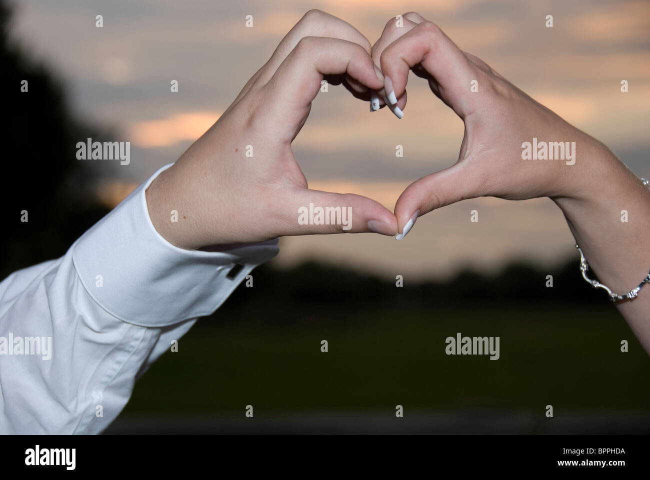 heart shape made with hands Stock Photo - Alamy