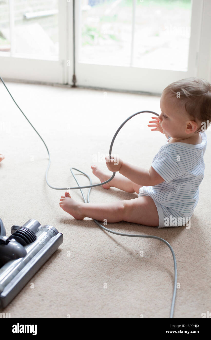 Baby boy playing cable wire hi-res stock photography and images - Alamy