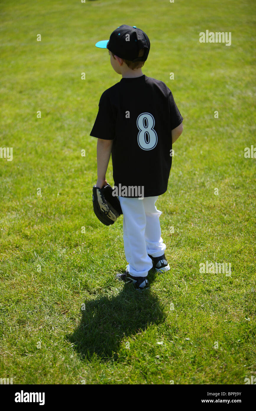 Young boy playing baseball Stock Photo - Alamy