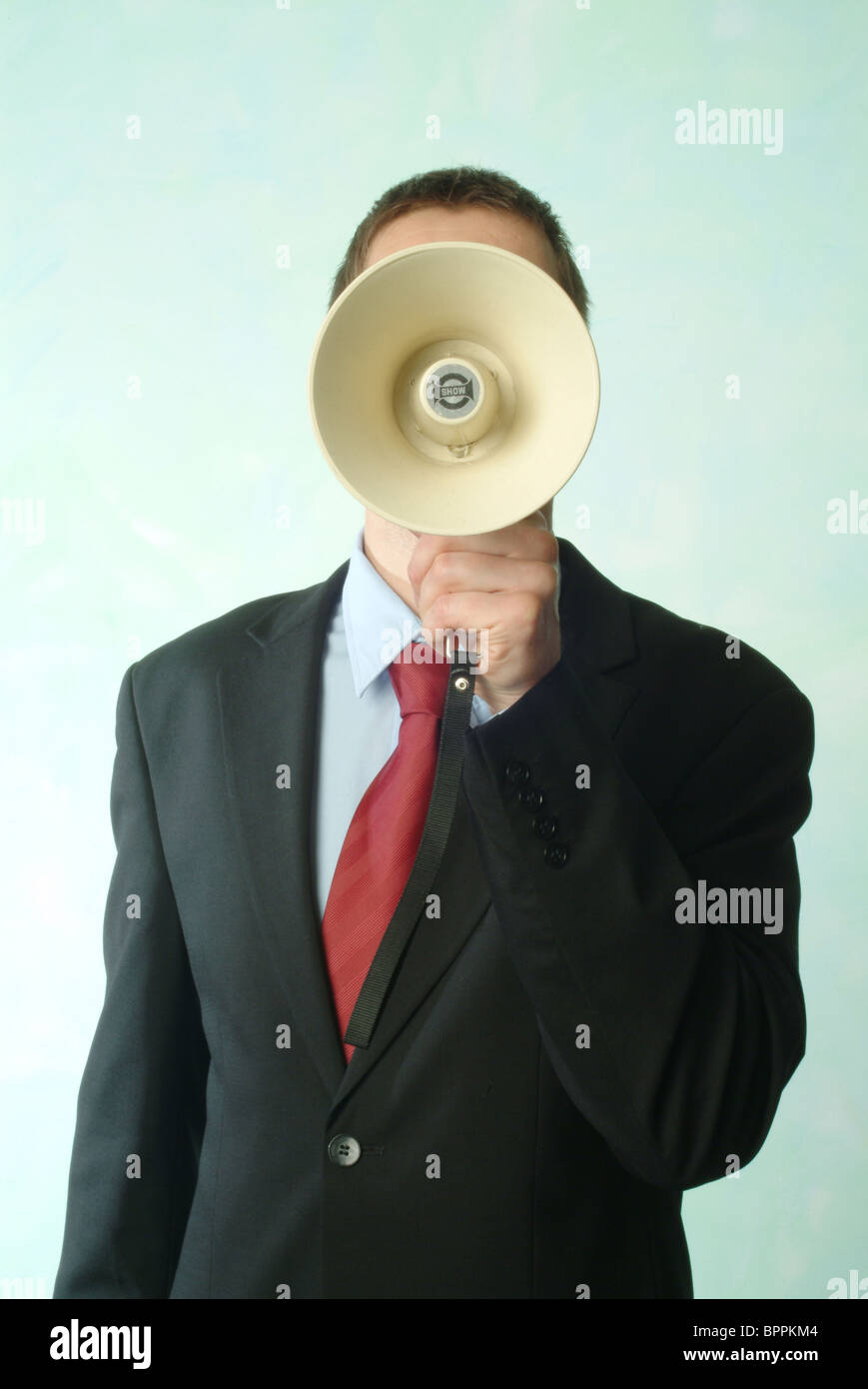Businessman speaking through megaphone hi-res stock photography and ...