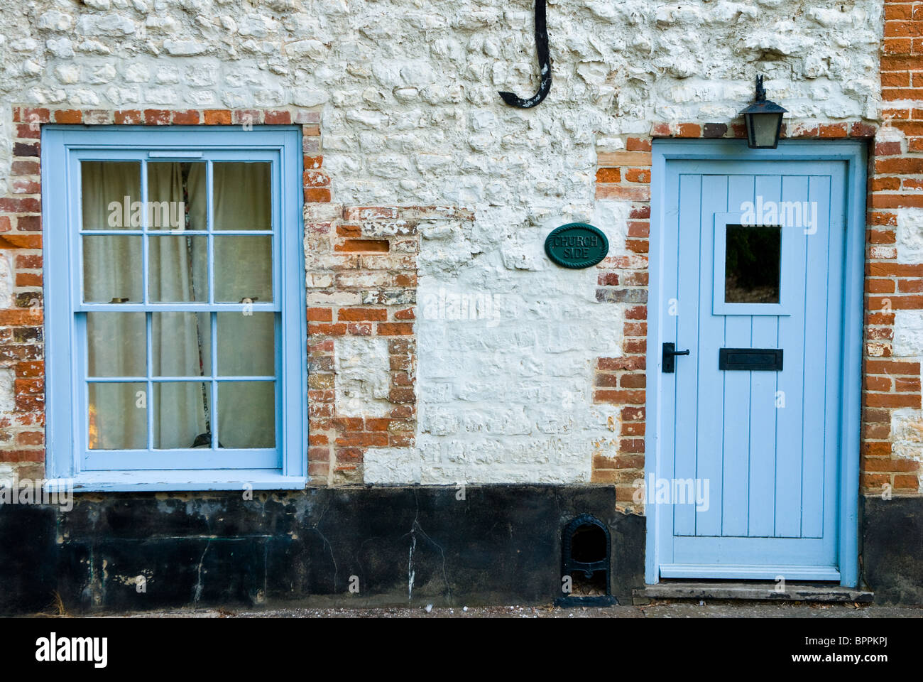 Traditional Norfolk housing using flint, hand made bricks and white ...