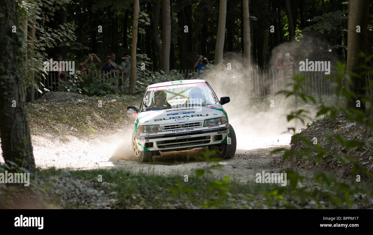 A Subaru rally car on the forest stage at Goodwood Festival of speed ...