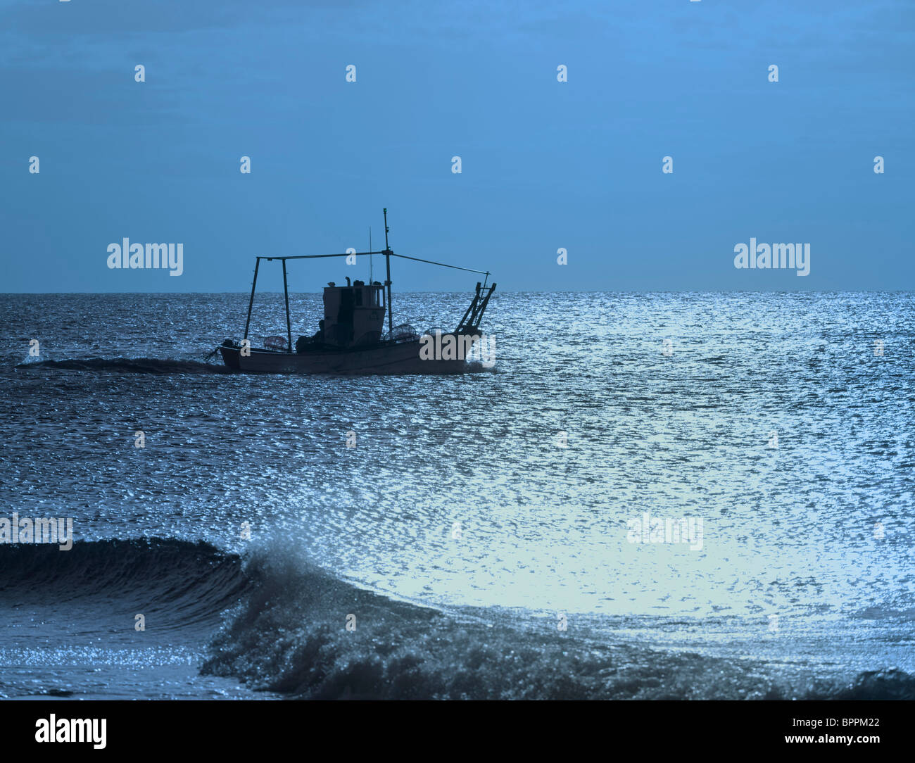 Fishing boat off Playamar beach, Torremolinos, Malaga Province, Costa ...