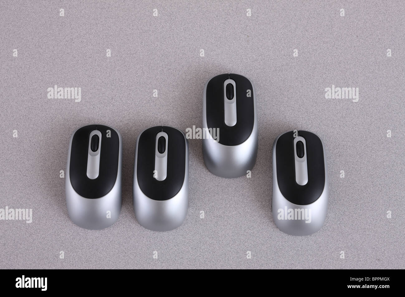 Four computer mice racing Stock Photo - Alamy