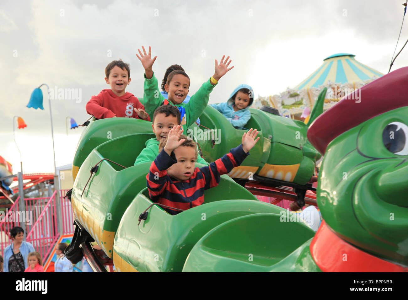 Young chldren having fun at the fun fair Stock Photo - Alamy