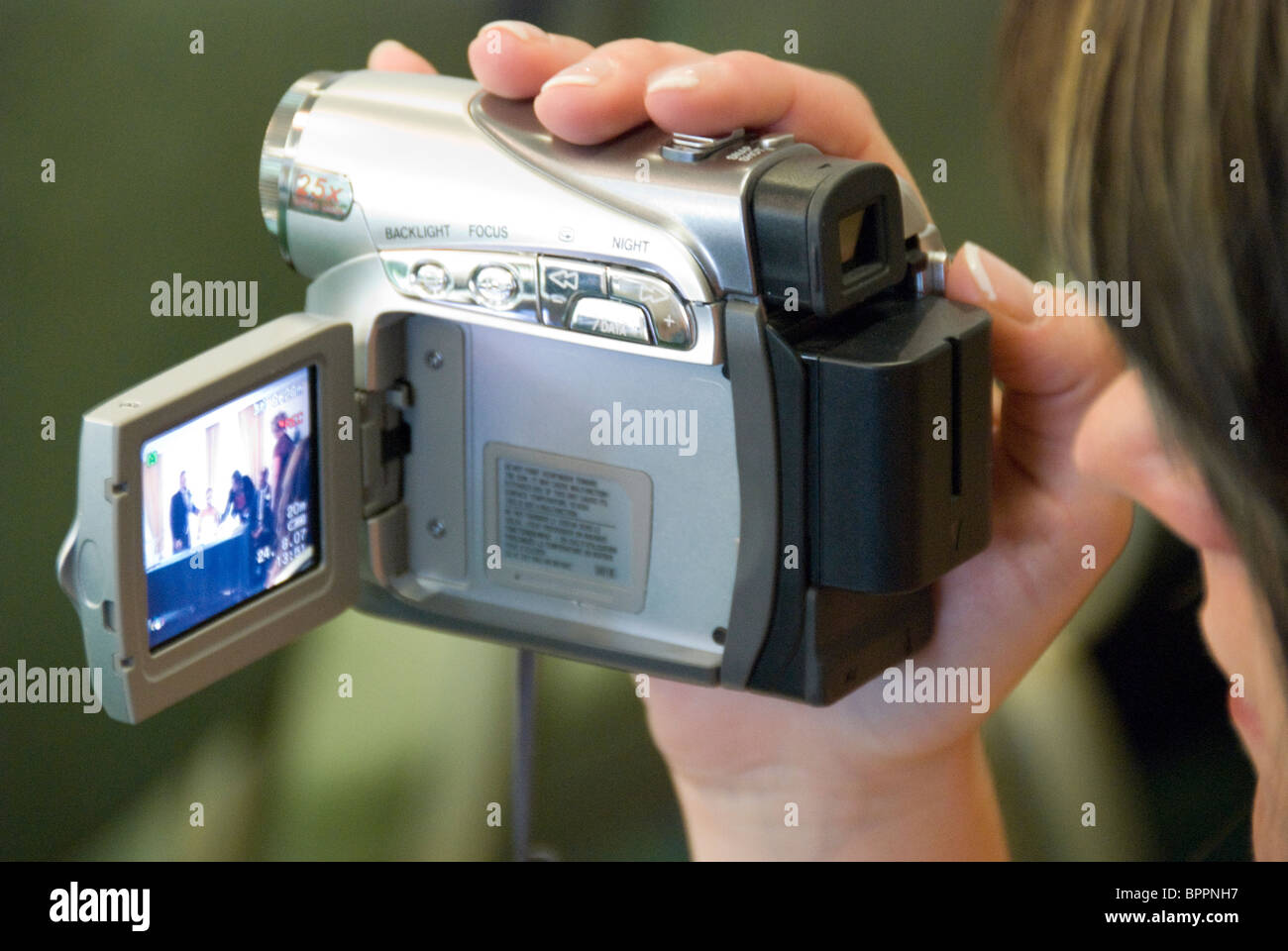 woman filming wedding Stock Photo - Alamy