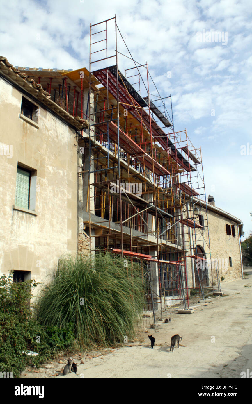Construction of a house in a village Stock Photo - Alamy