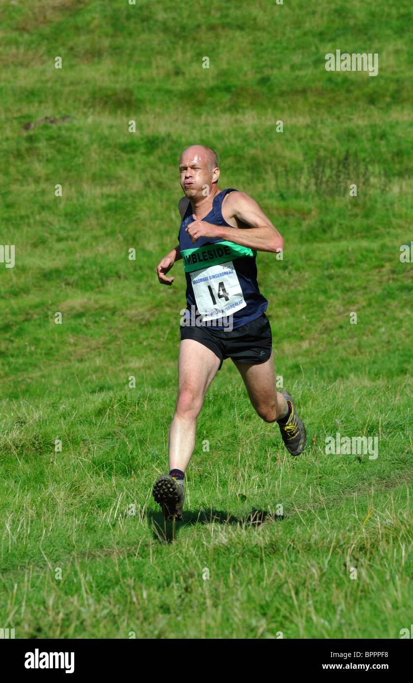 Fell runner competing at Grasmere Sports in the senior guides race ...