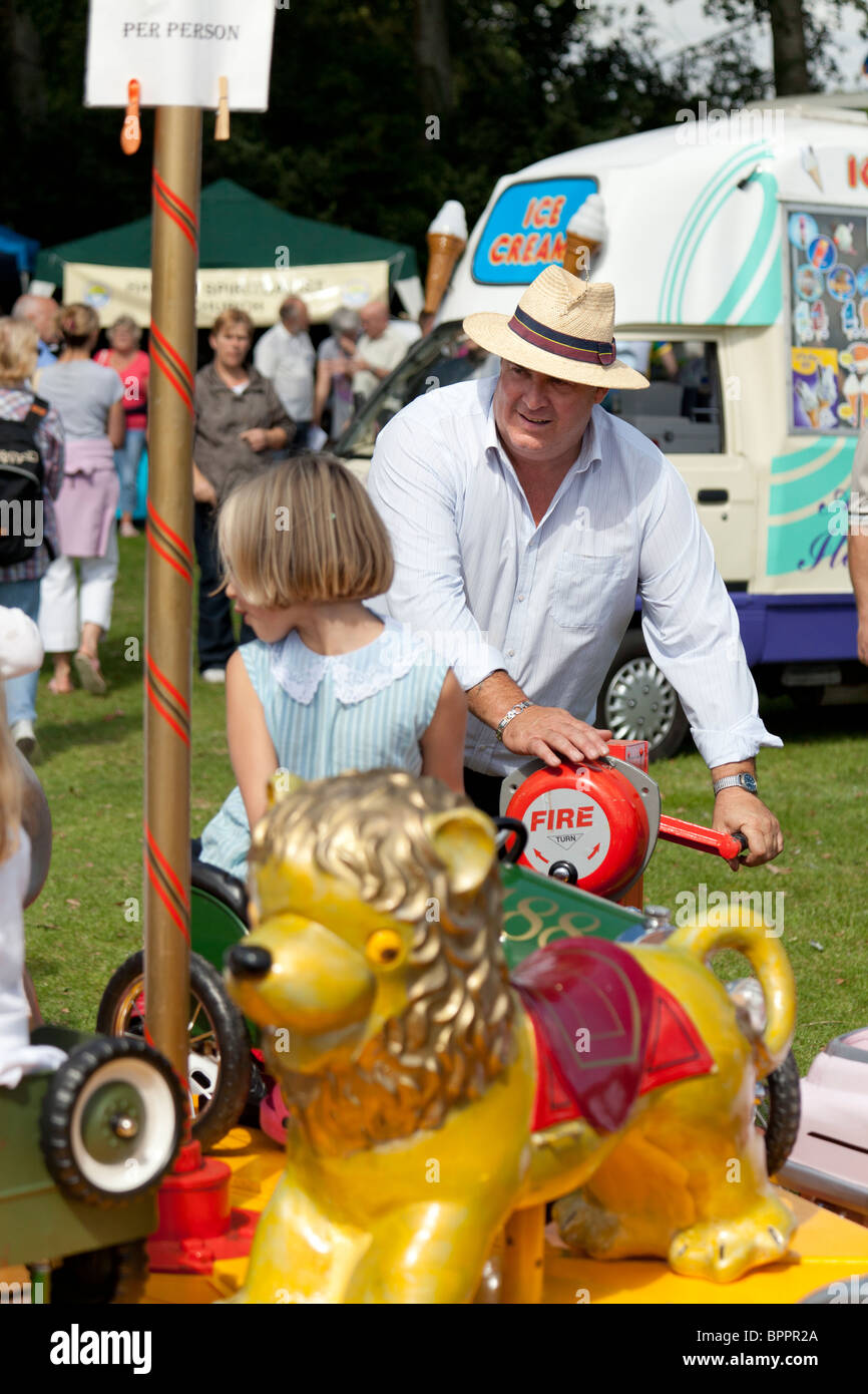 Infant ride funfair hi-res stock photography and images - Alamy