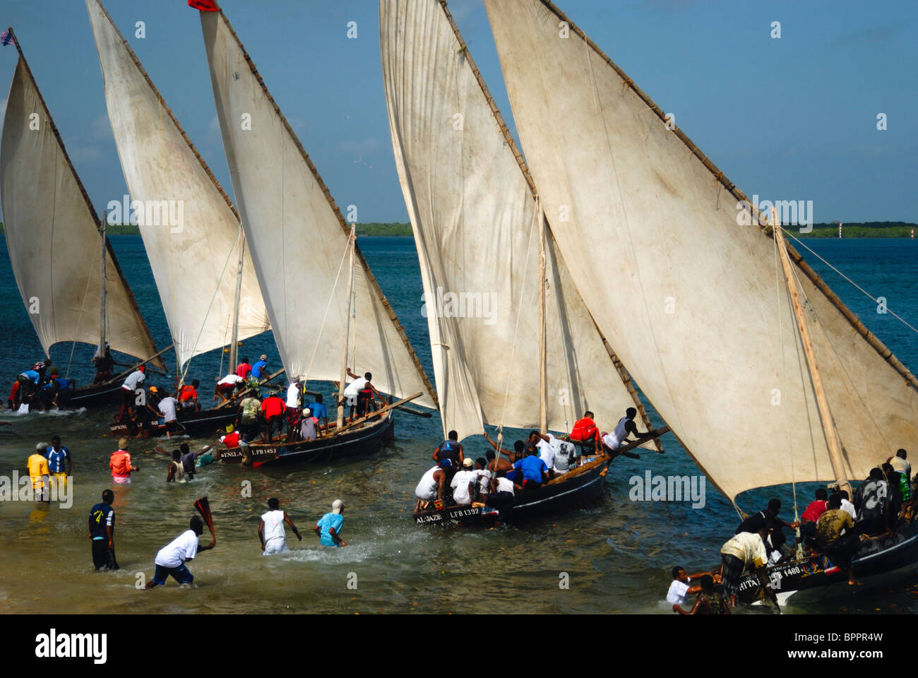 Start of the New Year's Day dhow race, Lamu Island, Kenya Stock Photo ...