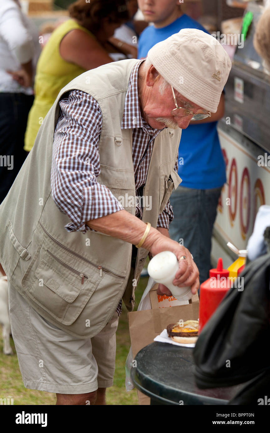 Adding extra salt hi-res stock photography and images - Alamy