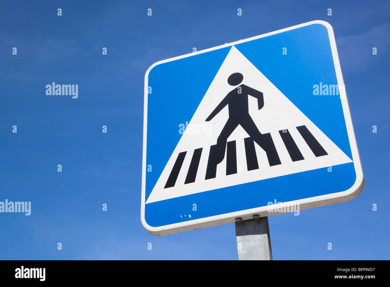 Pedestrian crossing road traffic sign Stock Photo - Alamy