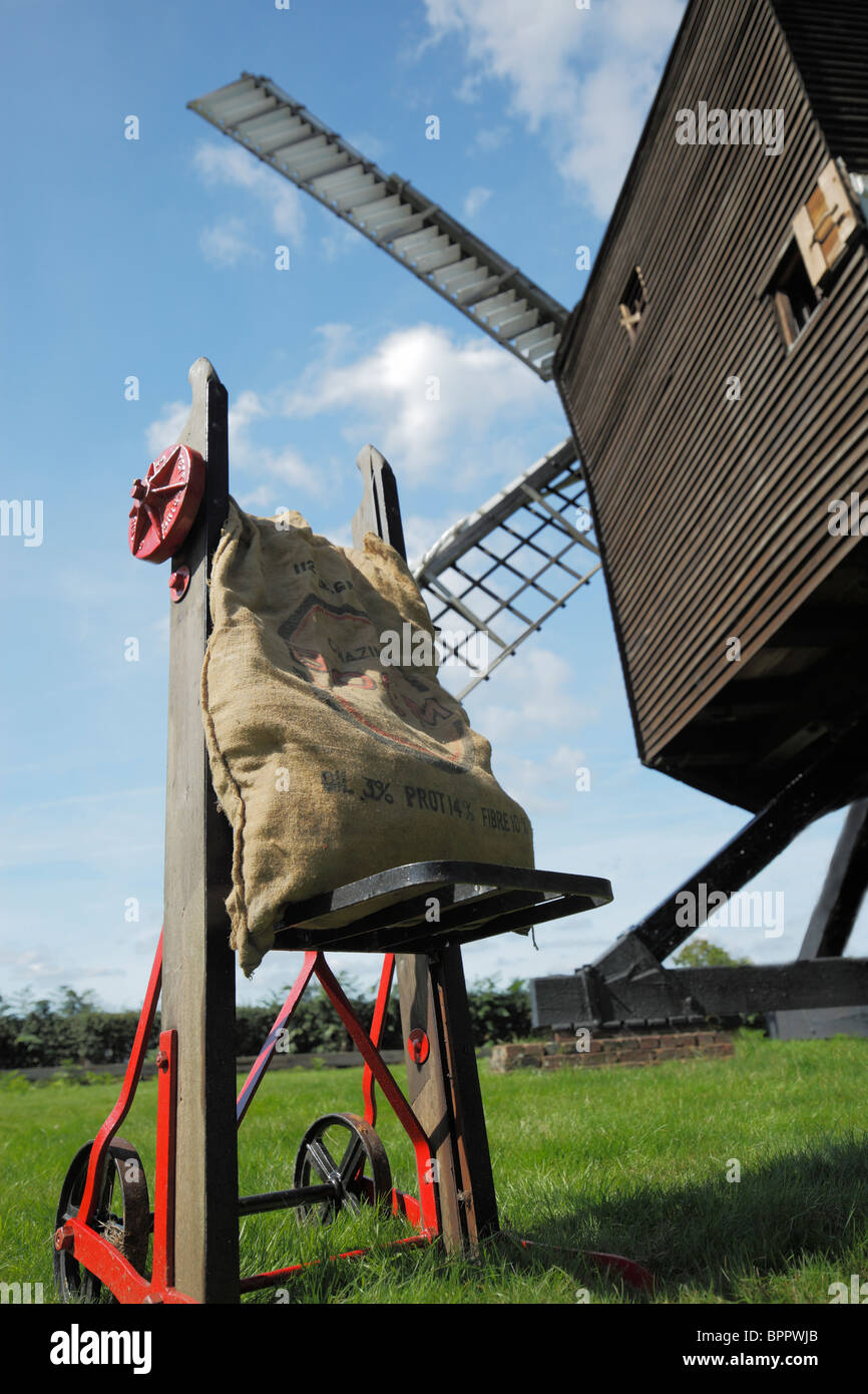Sack of flour on an old trolley beside a windmill Stock Photo - Alamy