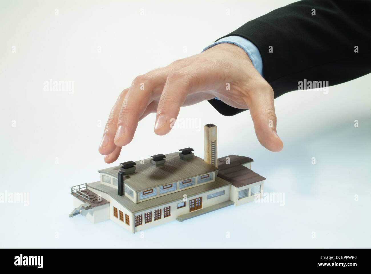 Hand reaching factory model hi-res stock photography and images - Alamy