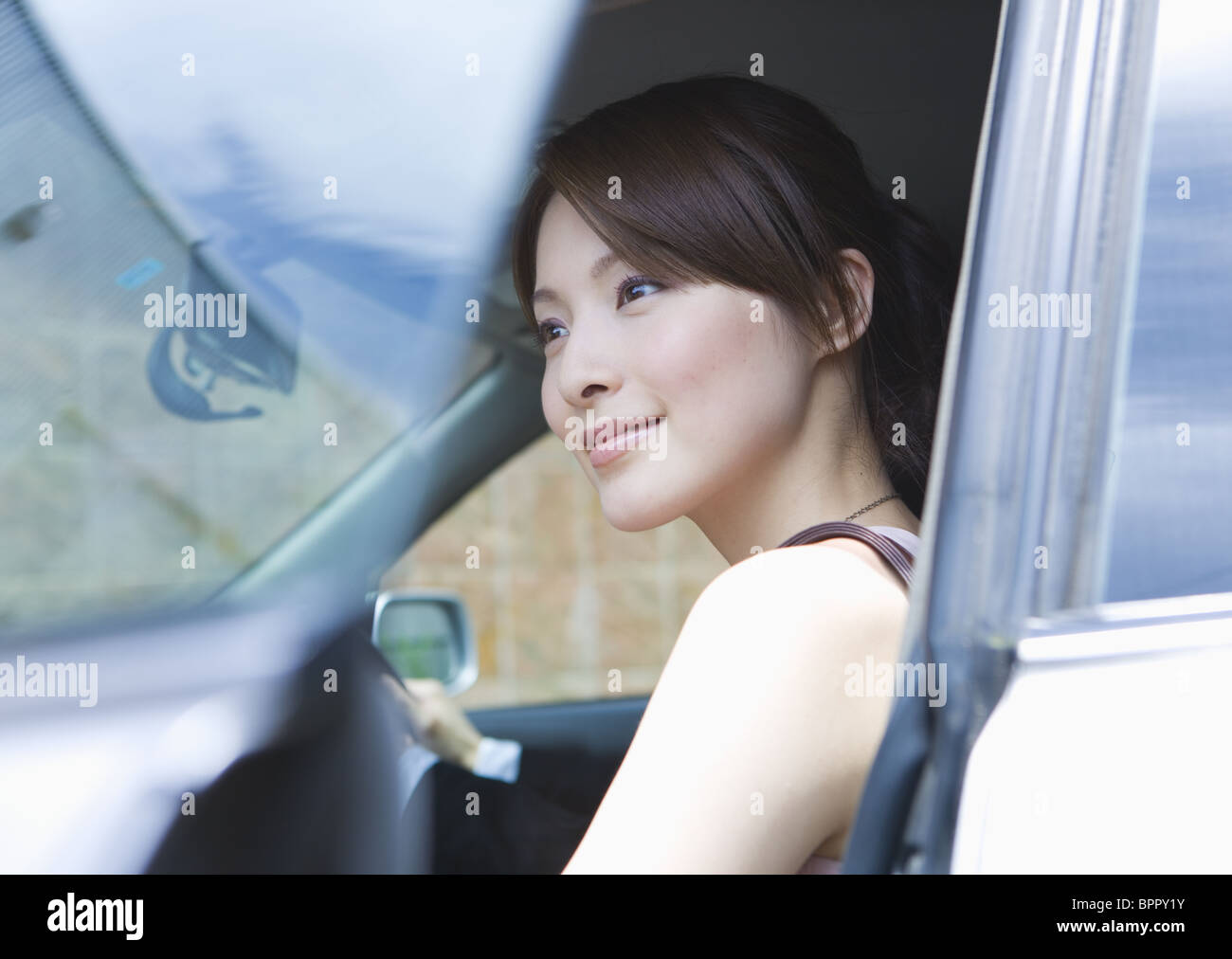 Young woman having a drive Stock Photo - Alamy