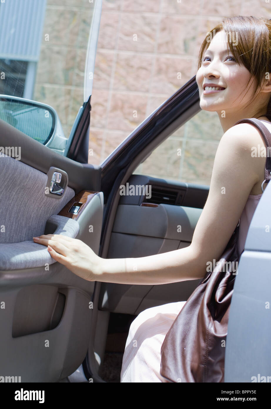 Young woman having a drive Stock Photo - Alamy
