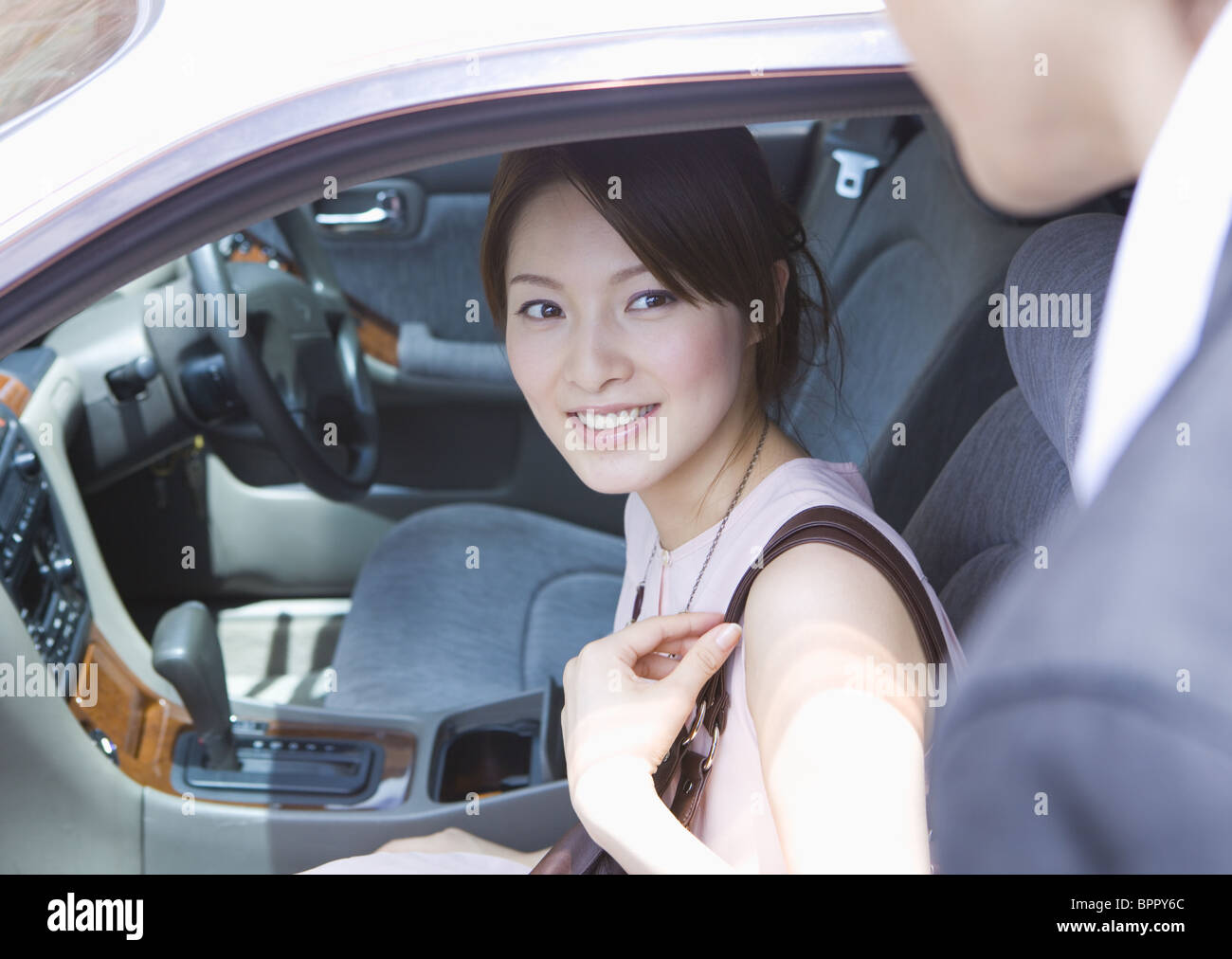 Couple having a drive Stock Photo - Alamy