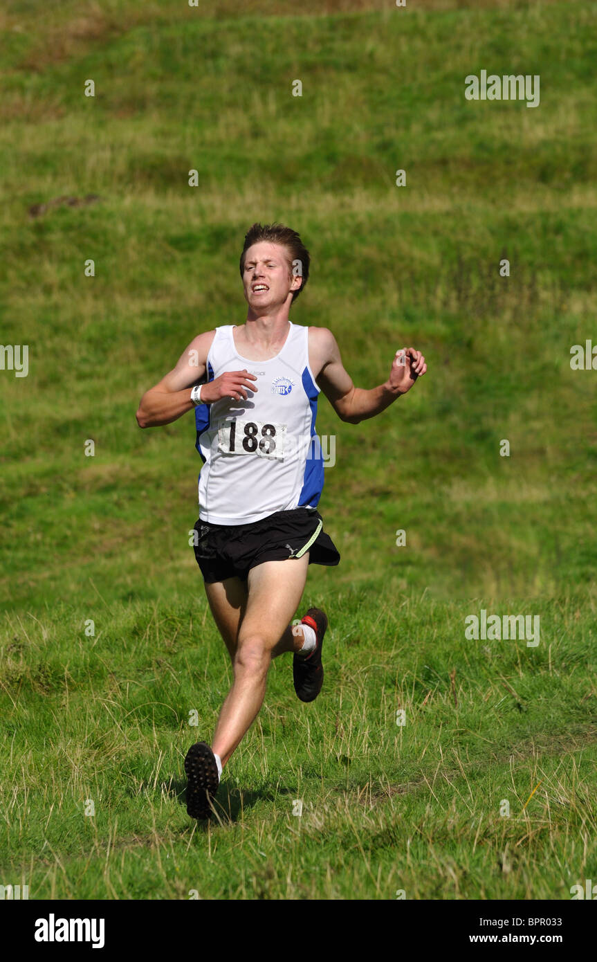 Fell runner competing at Grasmere sports in the senior guides race ...