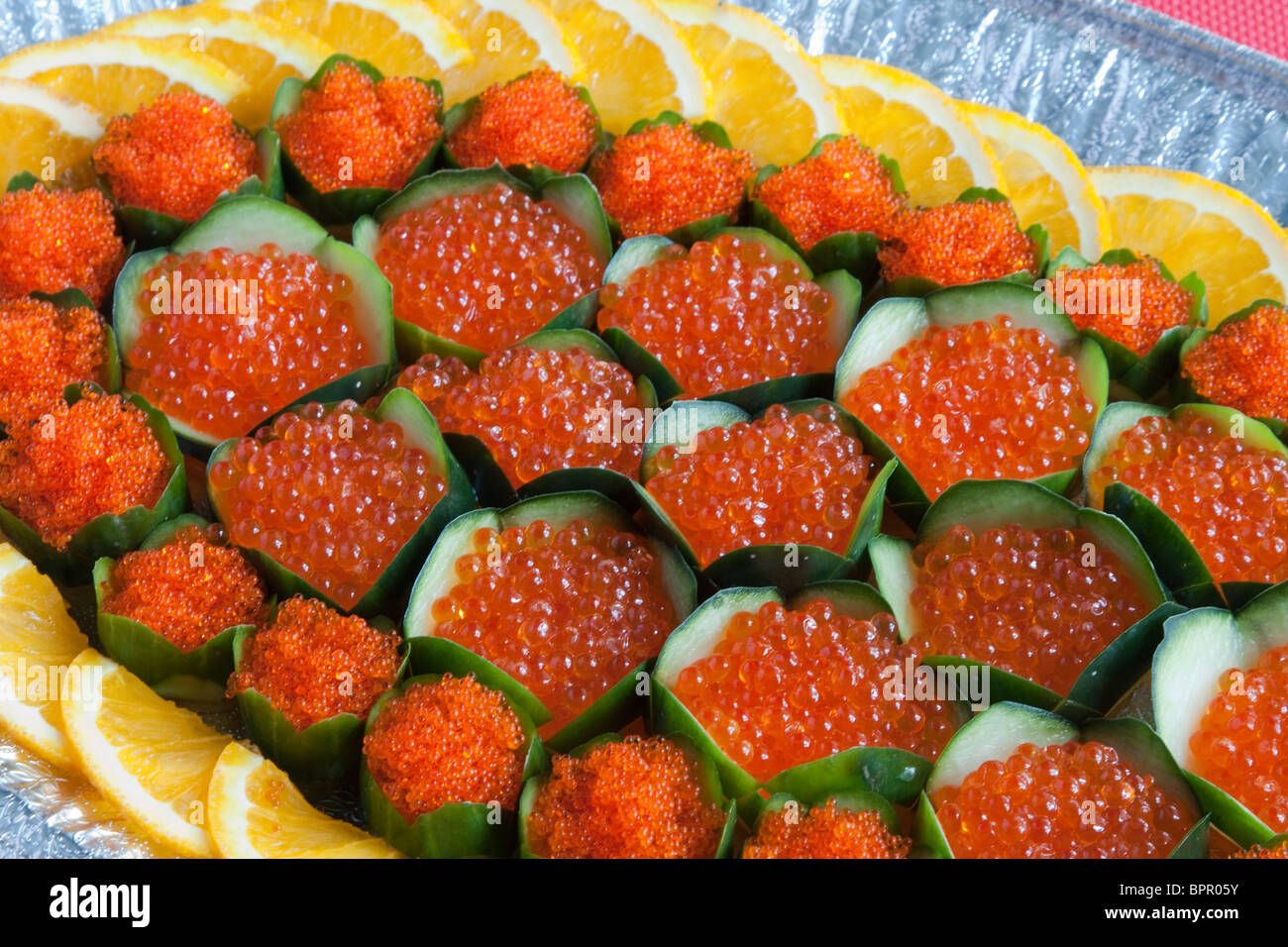 Orange colored caviar Stock Photo - Alamy
