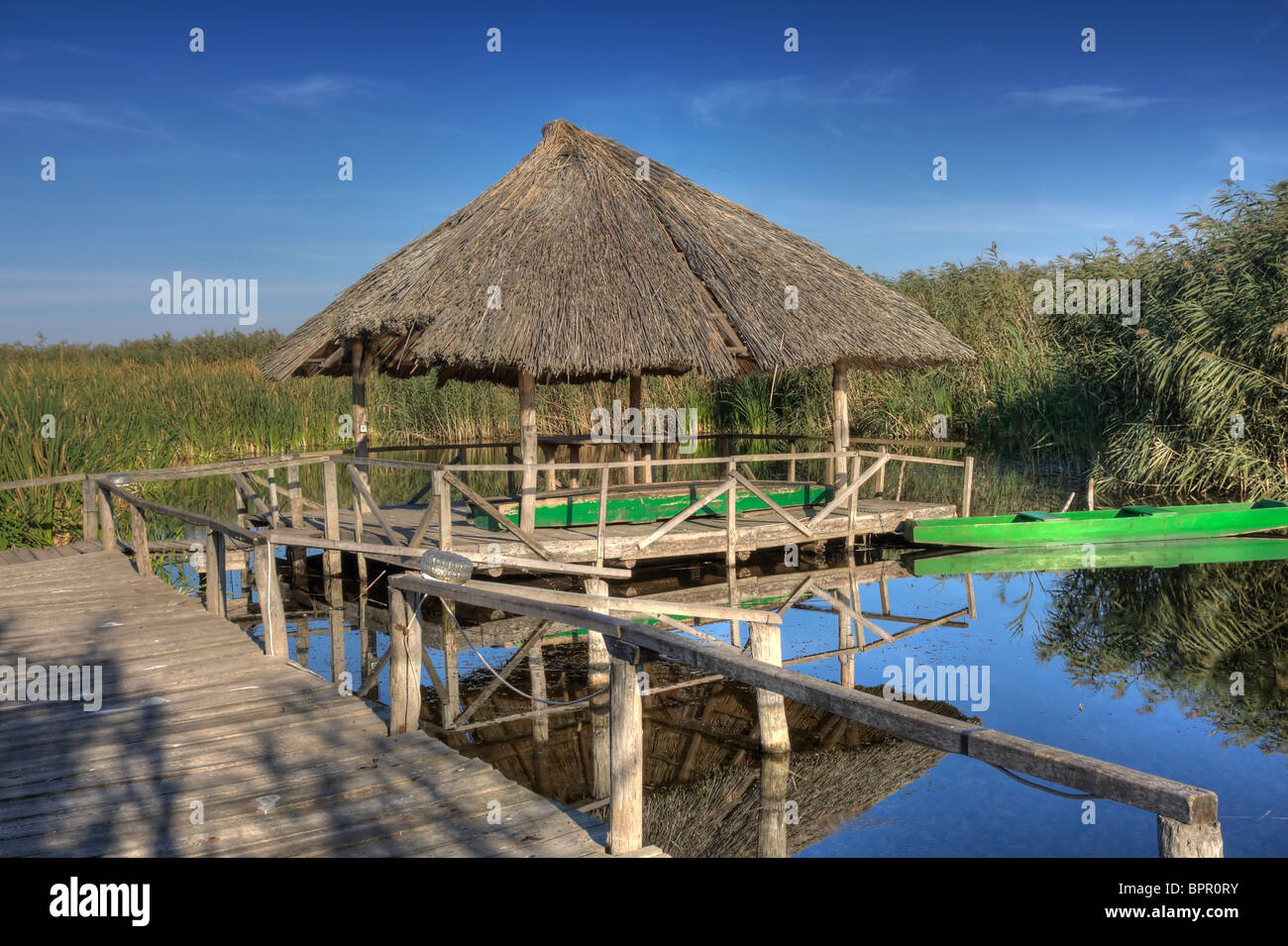 Rustic dock at Comana Natural Park, Romania Stock Photo - Alamy