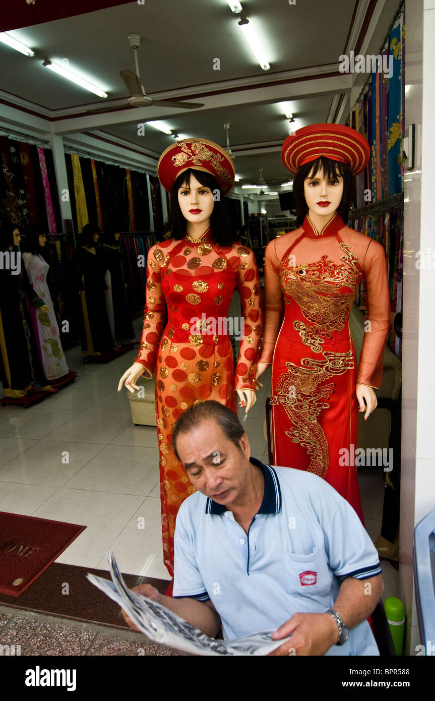 A local tailor outside his shop in Saigon Stock Photo - Alamy
