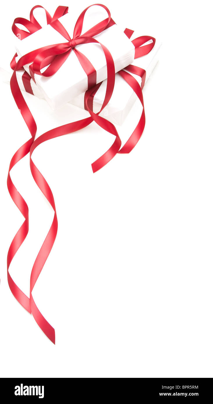 White gift boxes tied with red ribbons Stock Photo - Alamy