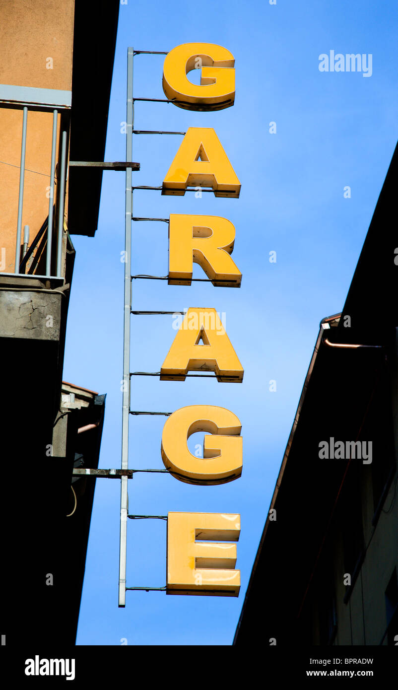 ITALY Tuscany Florence Sign in yellow letters attached to building and ...