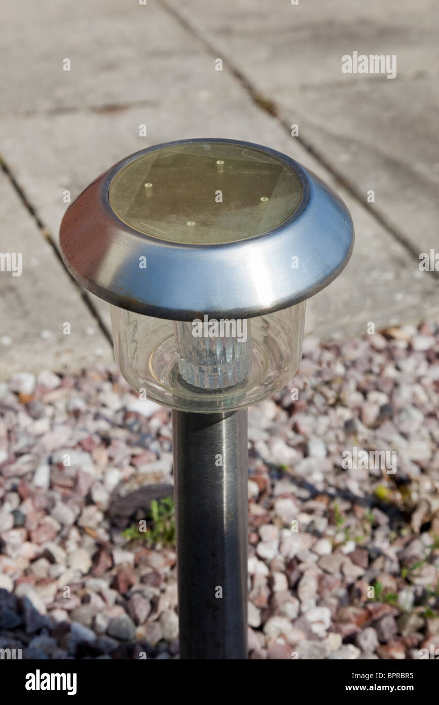 UK, Europe. Close up of a solar powered garden light outside in ...
