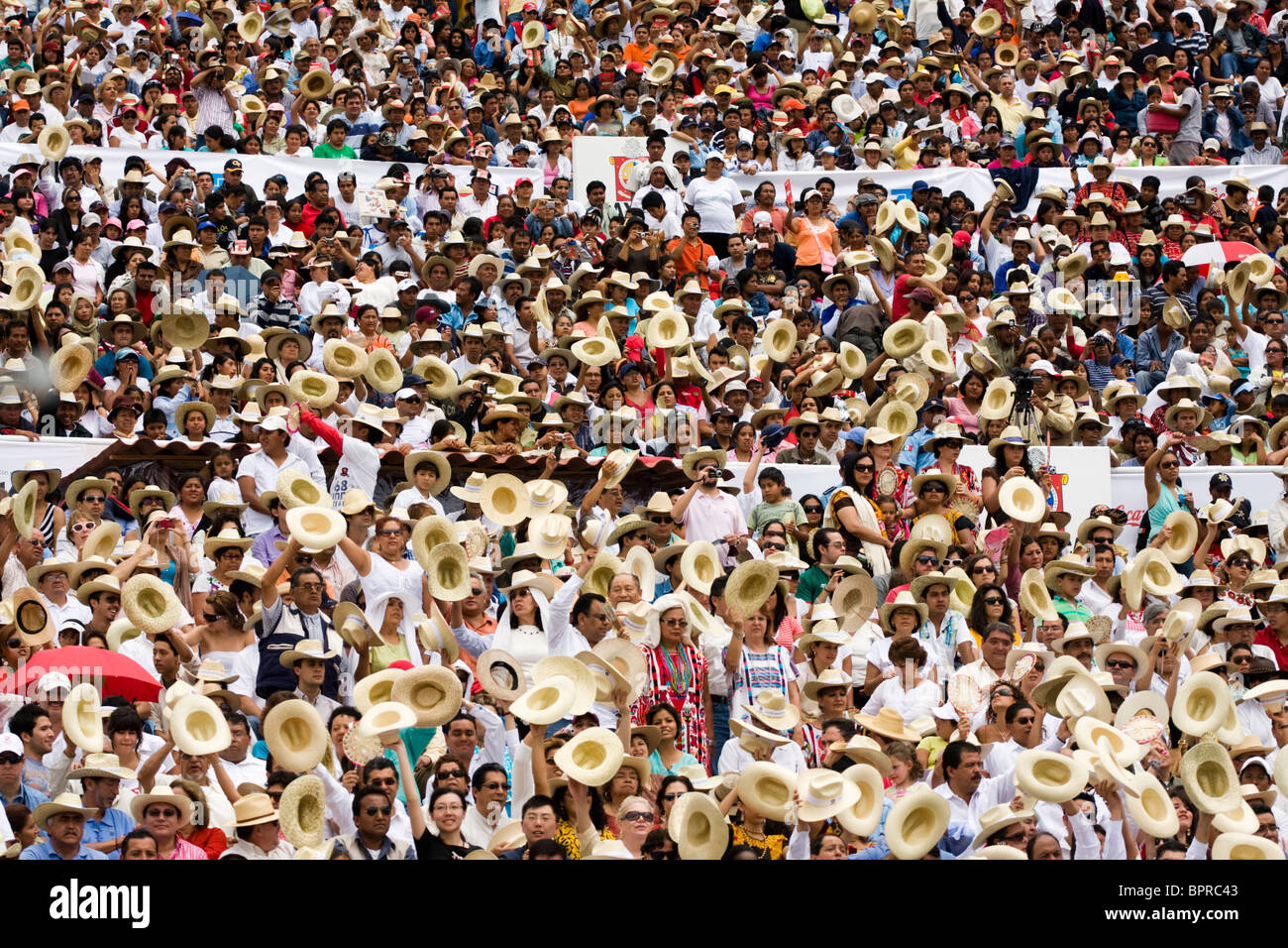 Crowd of spectators at a Guelaguetza celebration in Oaxaca City, Oaxaca ...