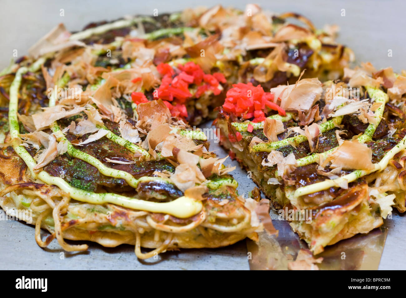 Pork Okonomi-yaki Japanese dish Stock Photo - Alamy