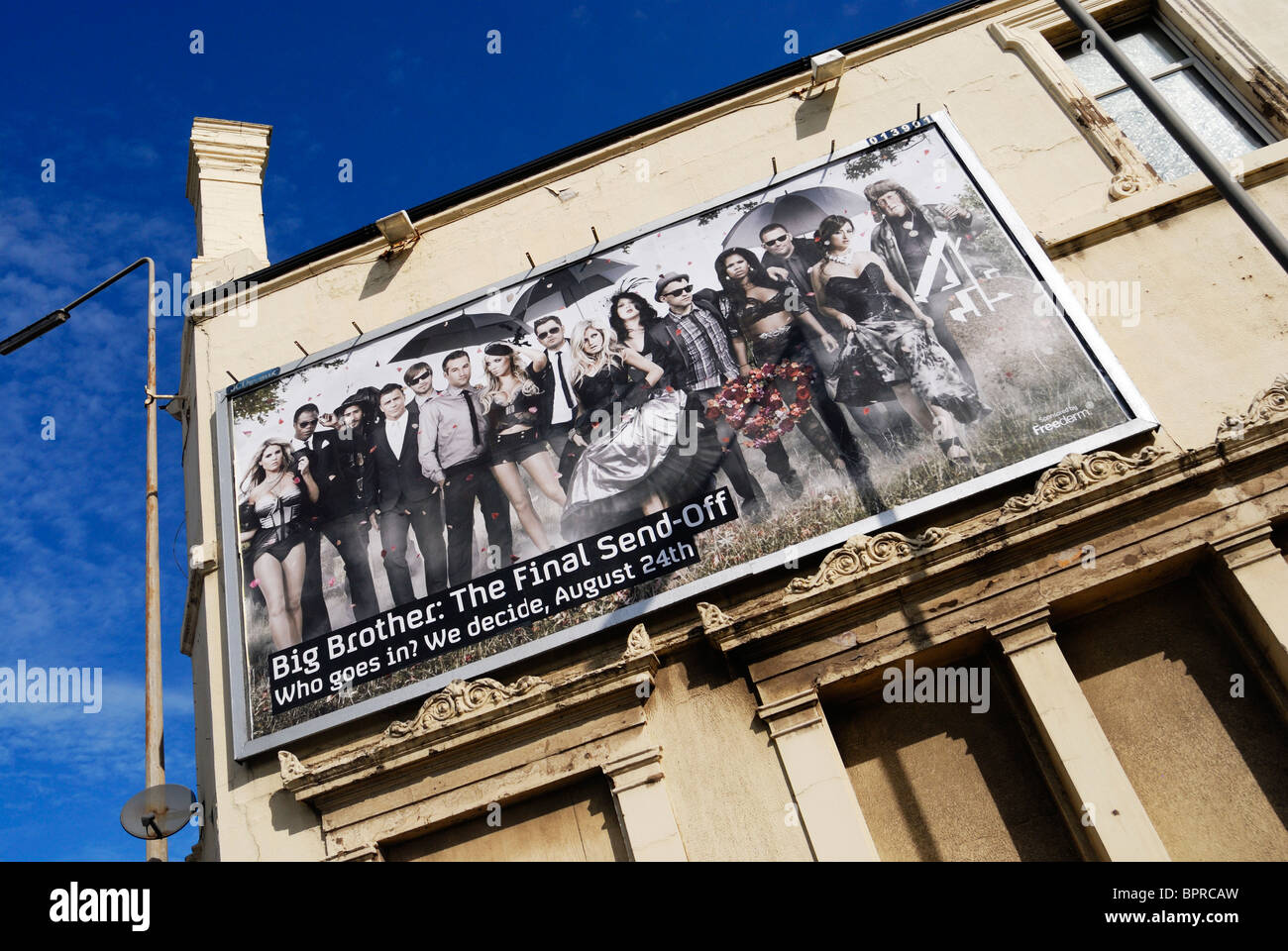 Billboards posted on the side of the closed and decaying former ...