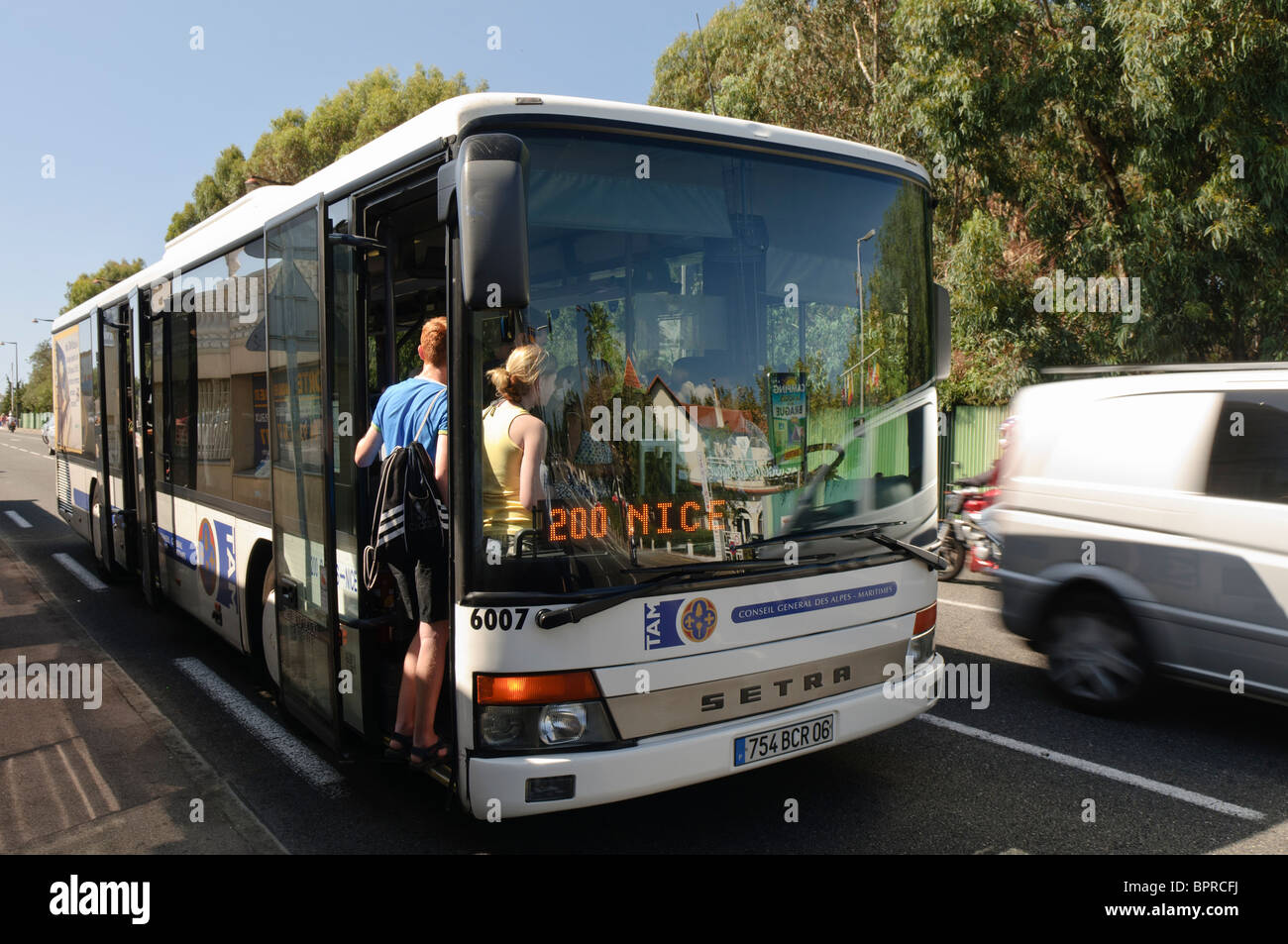 Passengers boarding a bus to Nice, France Stock Photo - Alamy