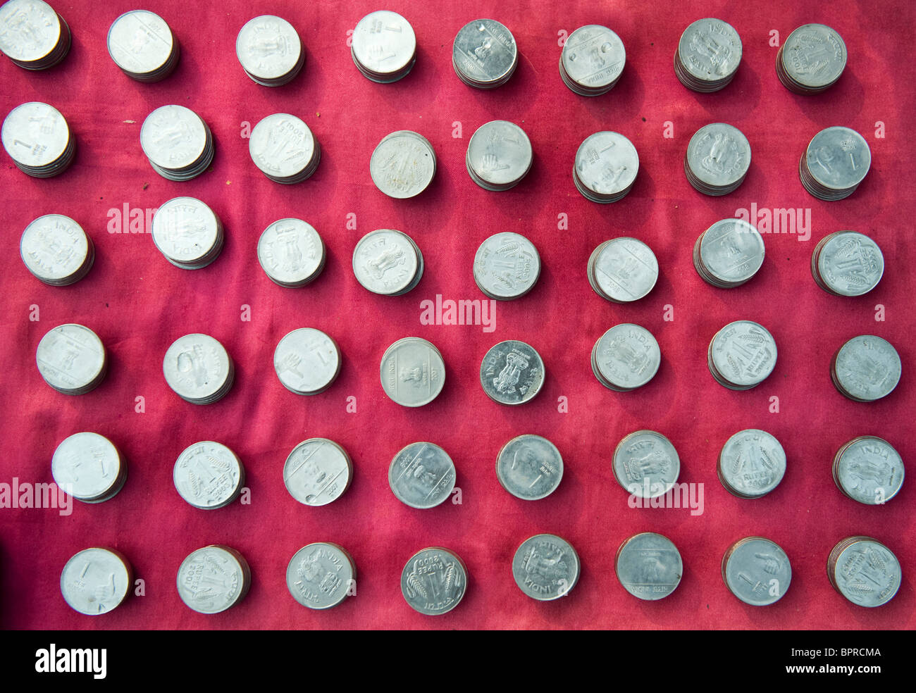 Money changer with change coins, Vrindavan, India Stock Photo - Alamy
