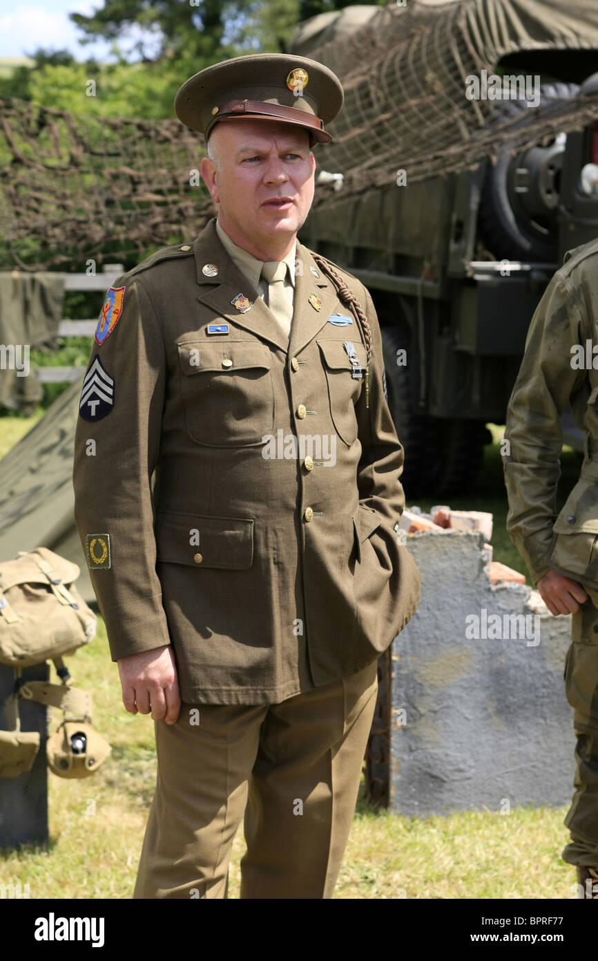 WW2 Reenactment Member wearing the uniform of a Technical Sargeant in ...