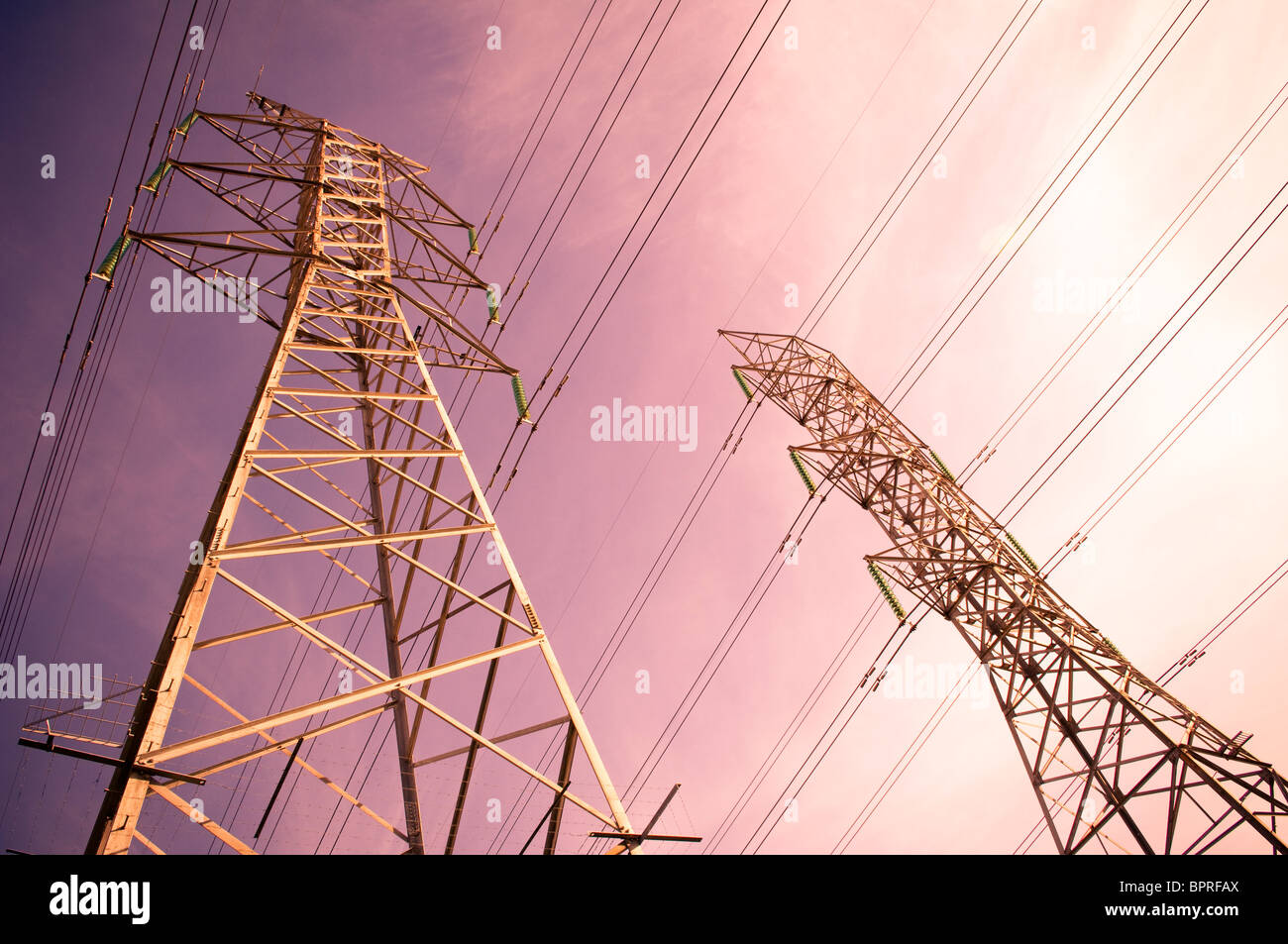 Massive power lines stretch into the distance Stock Photo - Alamy