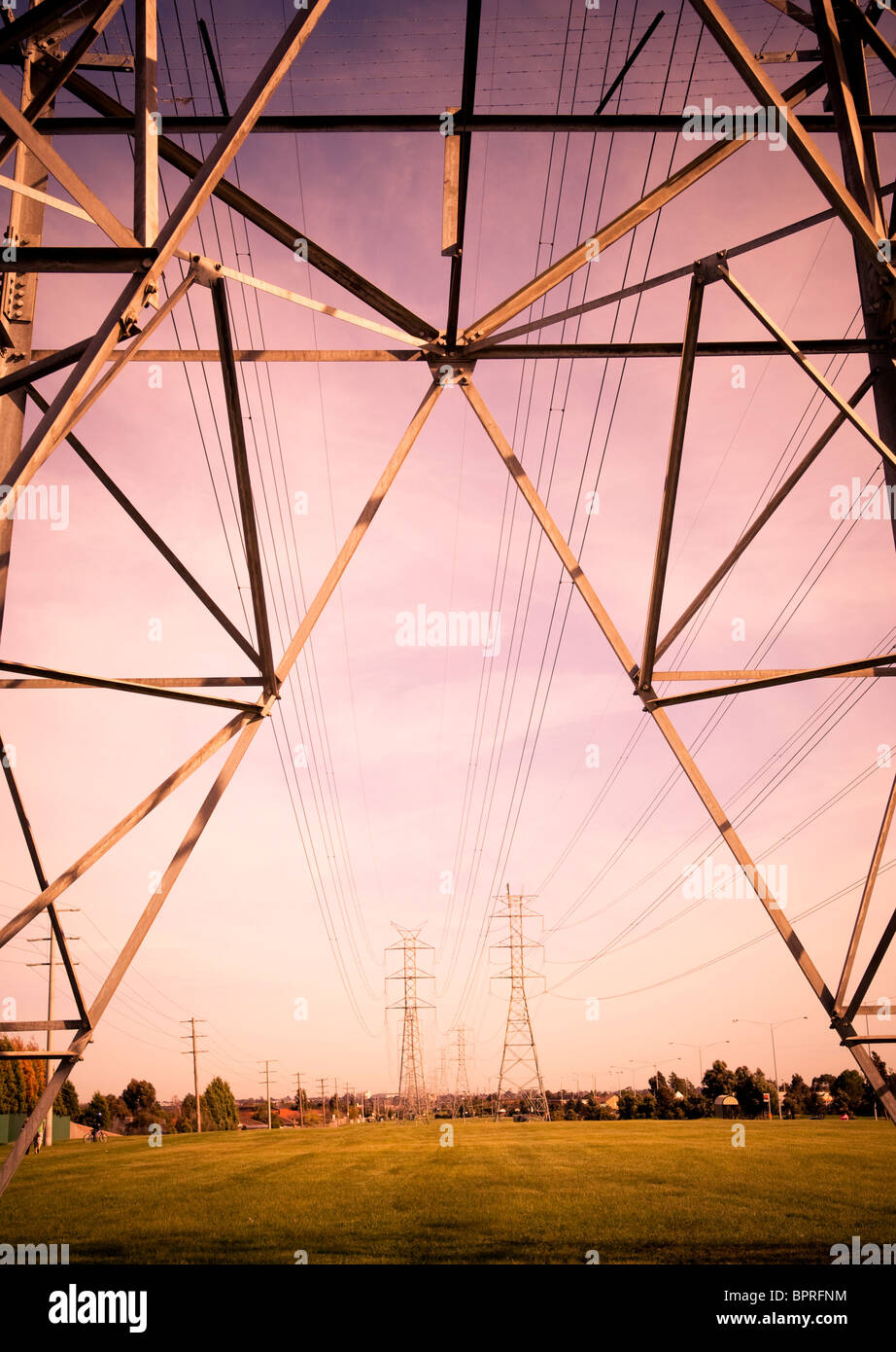 Massive power lines stretch into the distance Stock Photo - Alamy