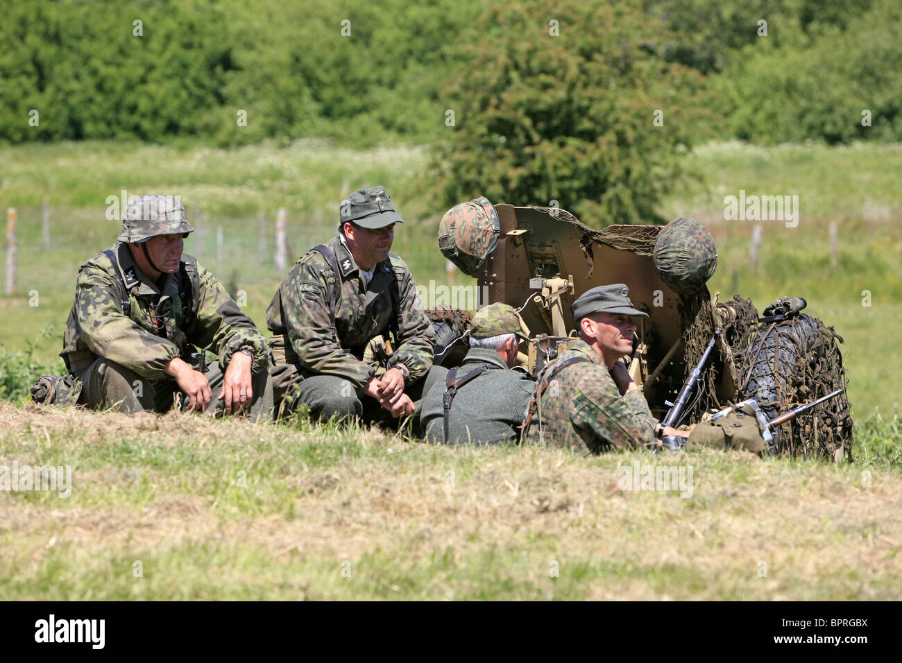 WW2 Reenactment members of the SS taking part in a mock battle weekend ...