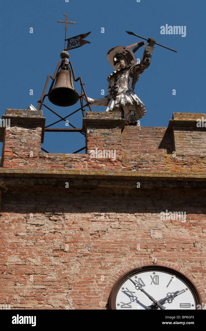 clocktower with harlequin striking bell in Montepulciano in Tuscany ...