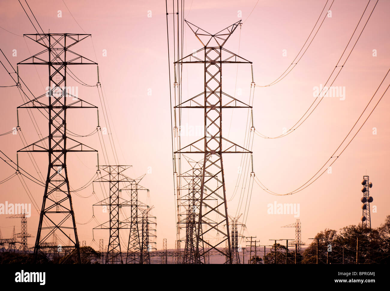 Massive power lines stretch into the distance Stock Photo - Alamy