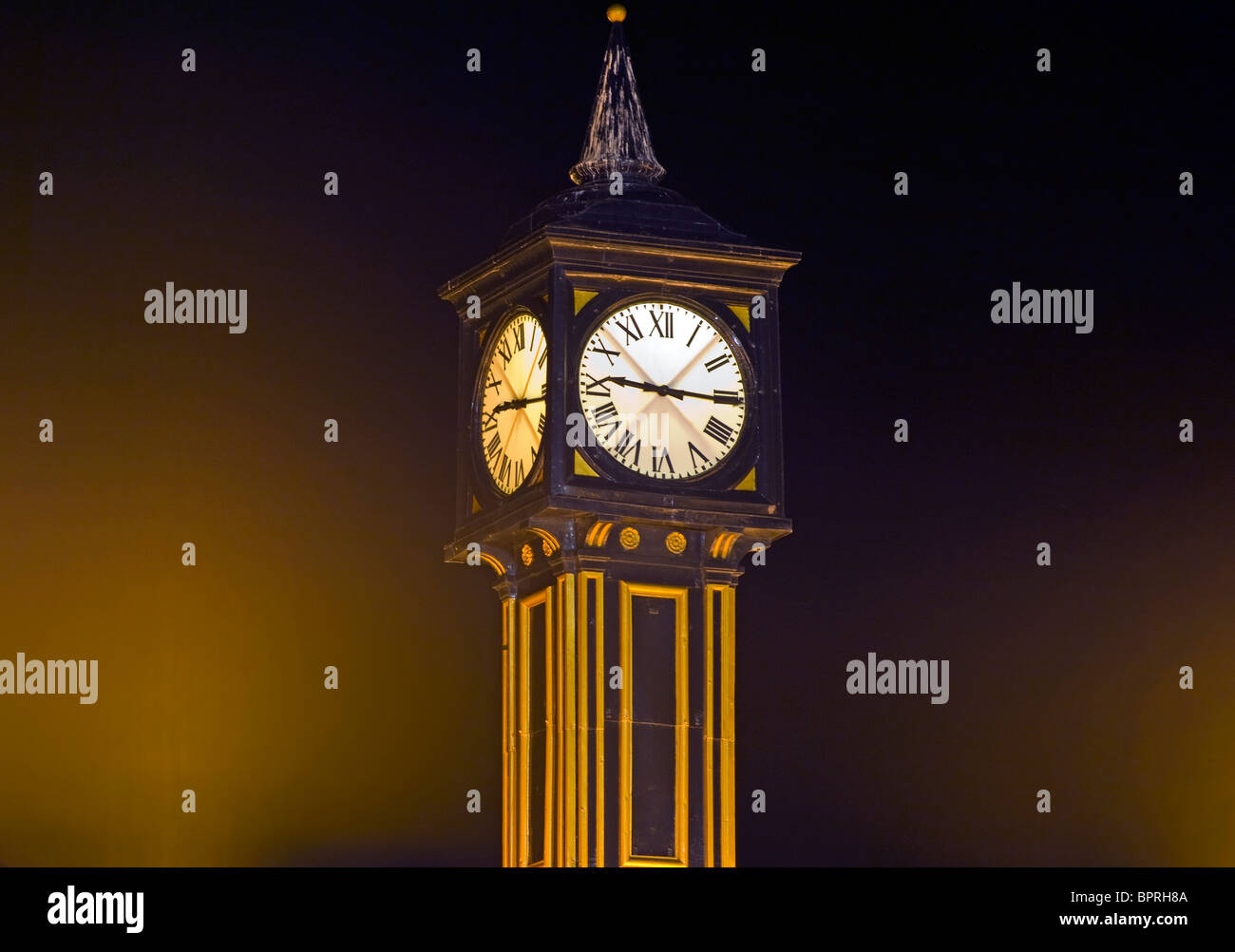 Clock At The Entrance To Brighton Pier Illuminated At Night East Sussex ...