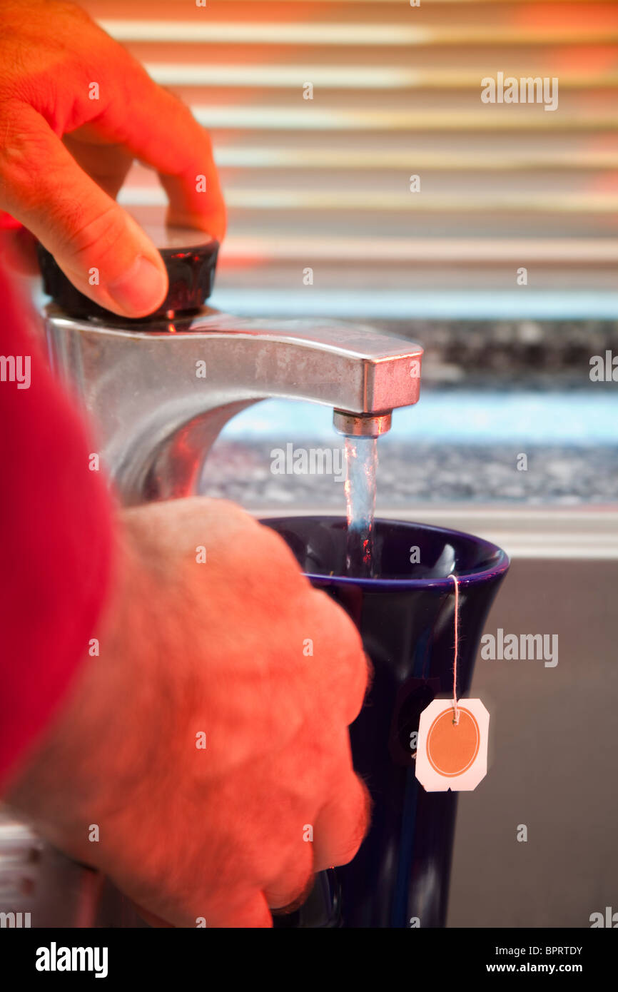 Man making cup of tea and teabag hi-res stock photography and images ...