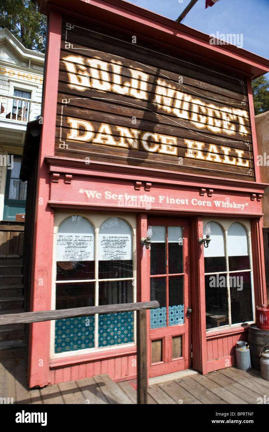 Western store facades along a wooden roller coaster, Disneyland Resort ...