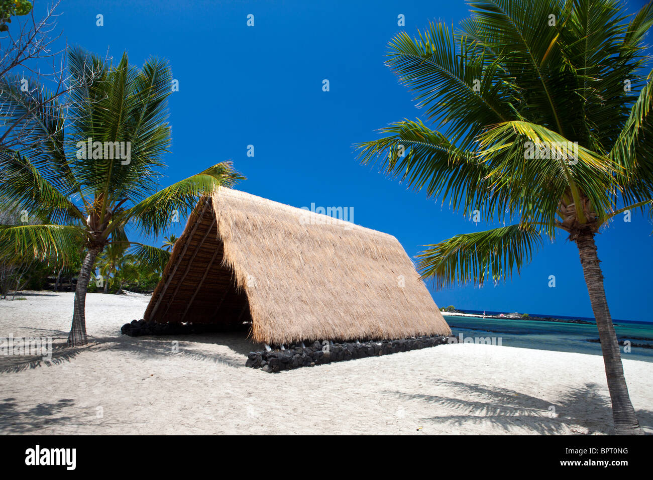 Ancient heiau temple, traditional hut on Honokohau Beach, Kaloko ...