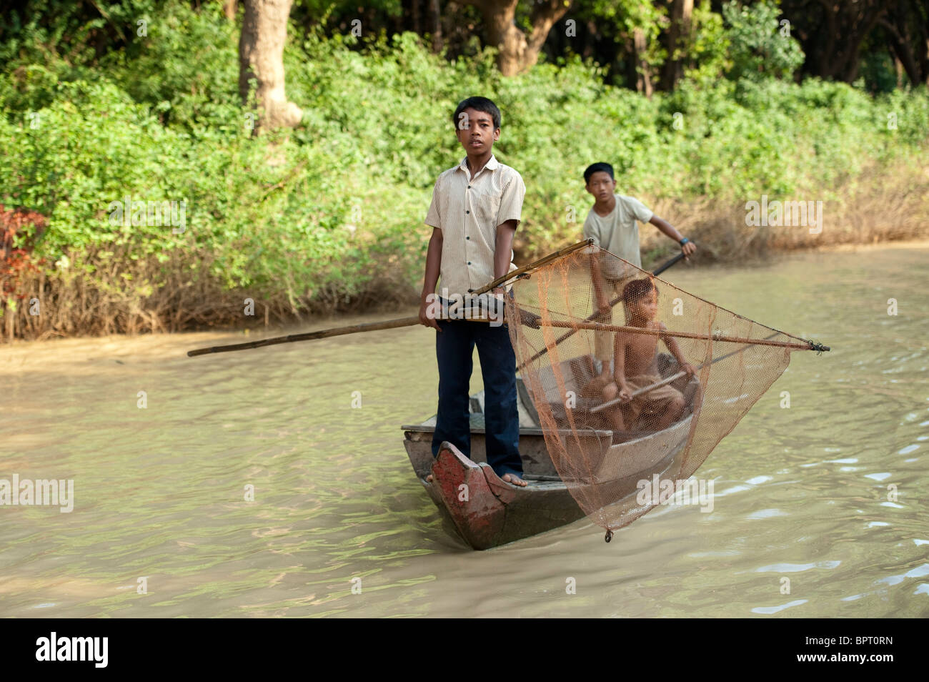 Tonle sap fishing boys hi-res stock photography and images - Alamy
