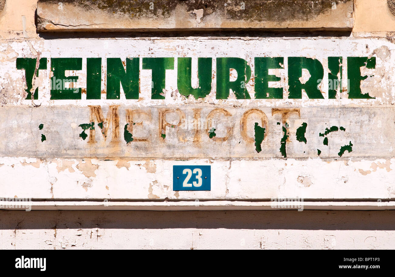 Teinturerie - old faded painted shop sign - France Stock Photo - Alamy